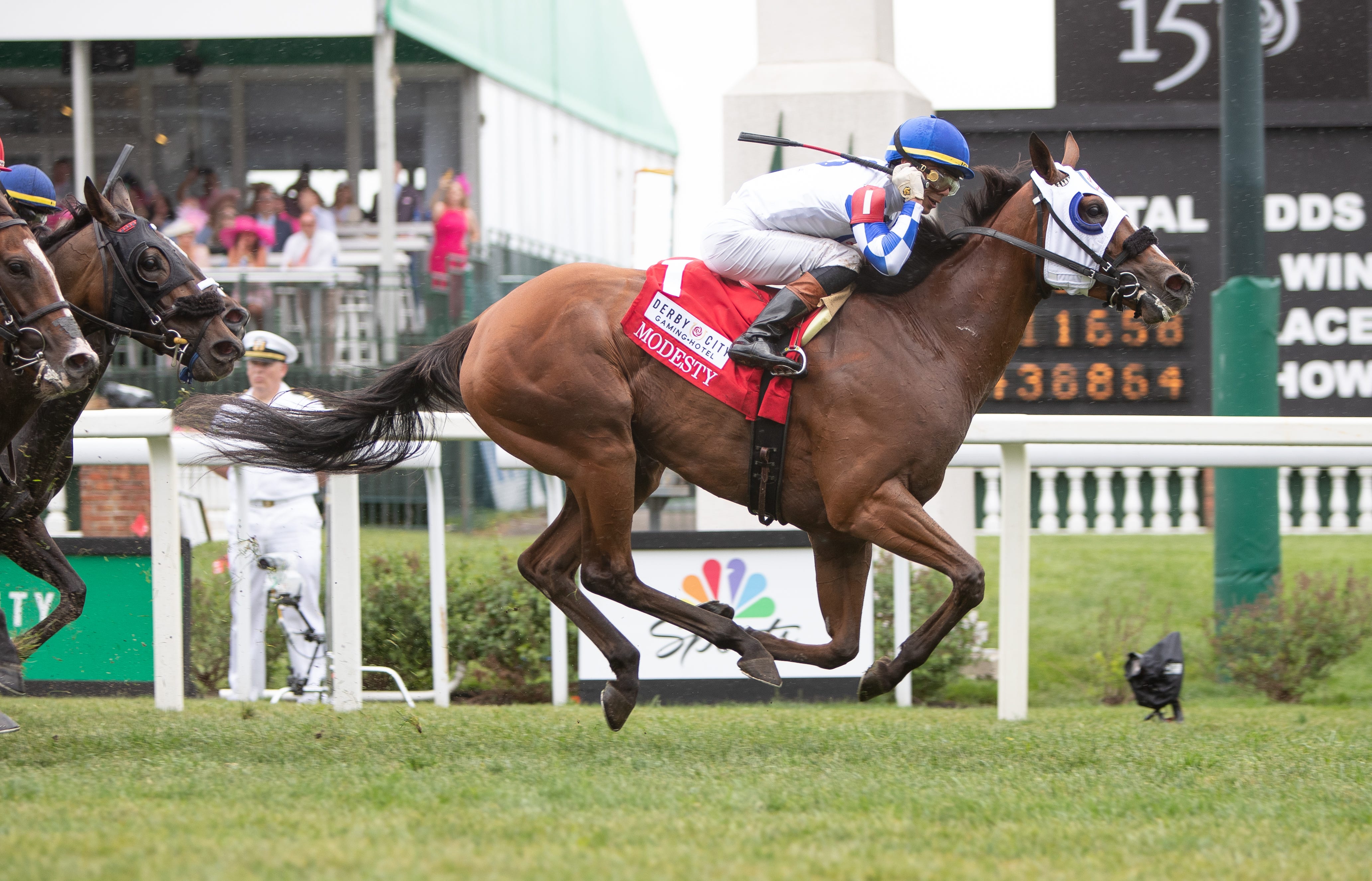 Fast as Flight enjoys the soft ground, takes Modesty in deep stretch